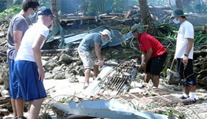 Samoa’s USS Athletes Assist with Tsunami Clean-up - FISU